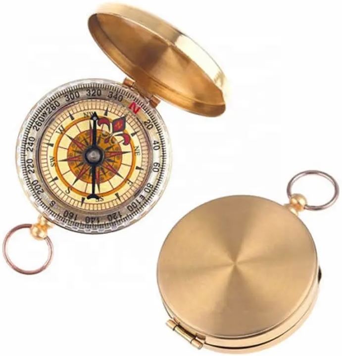 Eleganter klassischer Kompass aus Kupfer mit fluoreszierendem Ring ...